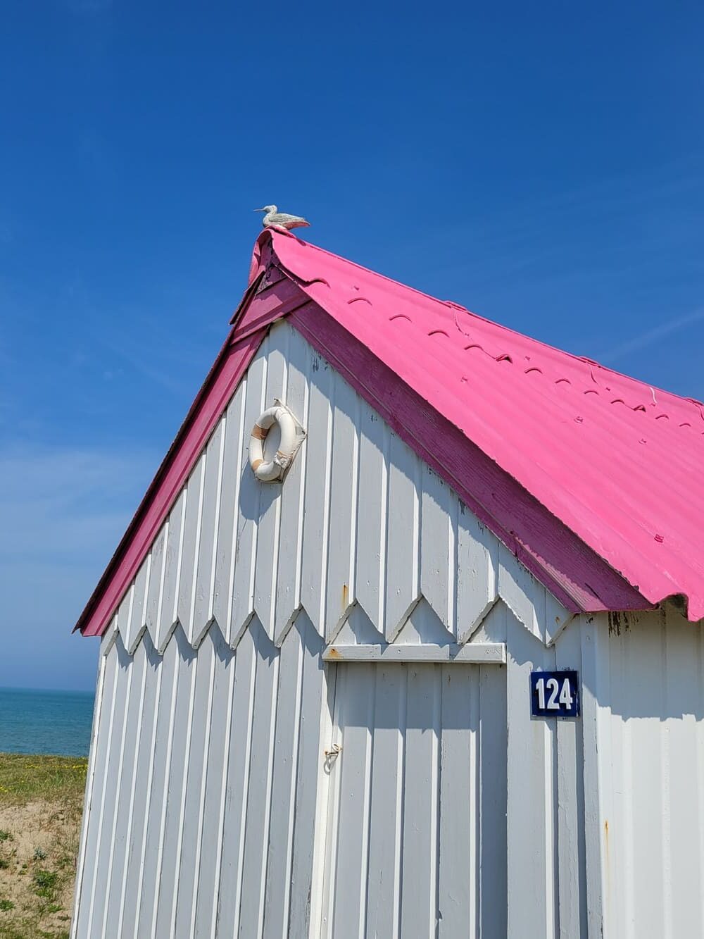 Flânez aux cabines de plage à Gouville-sur-Mer